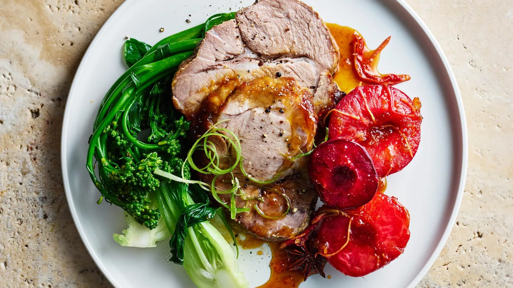 Slow-roasted pork neck with roast plums | Women's Weekly Food