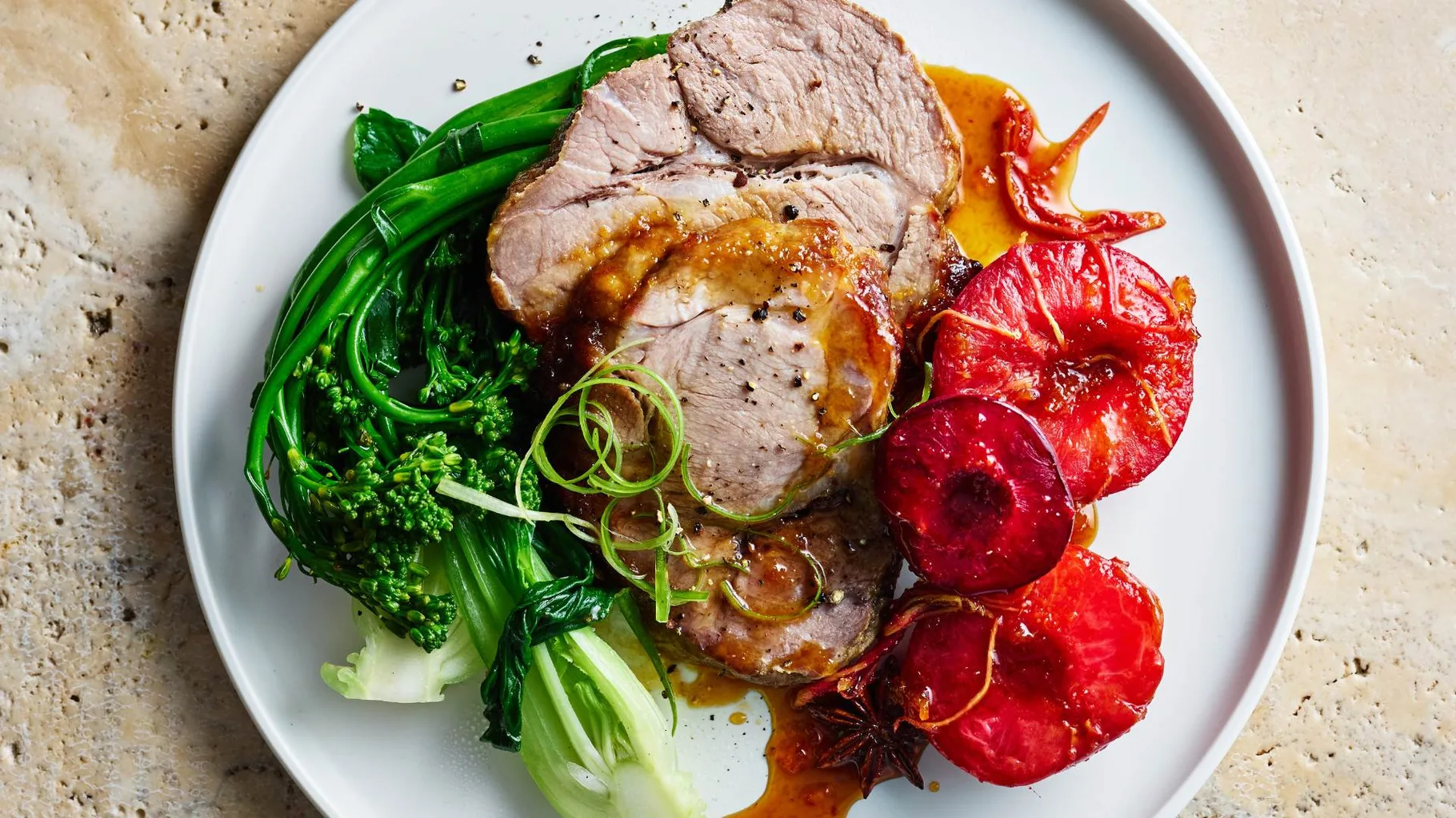 Slow-roasted pork neck with roast plums | Women's Weekly Food