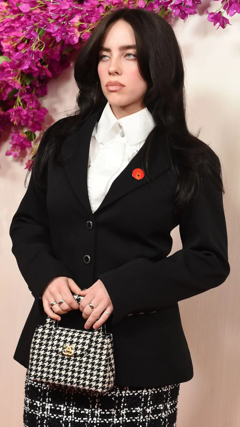 Why Are Celebrities Wearing Red Pins To The 2024 Oscars? | marie claire