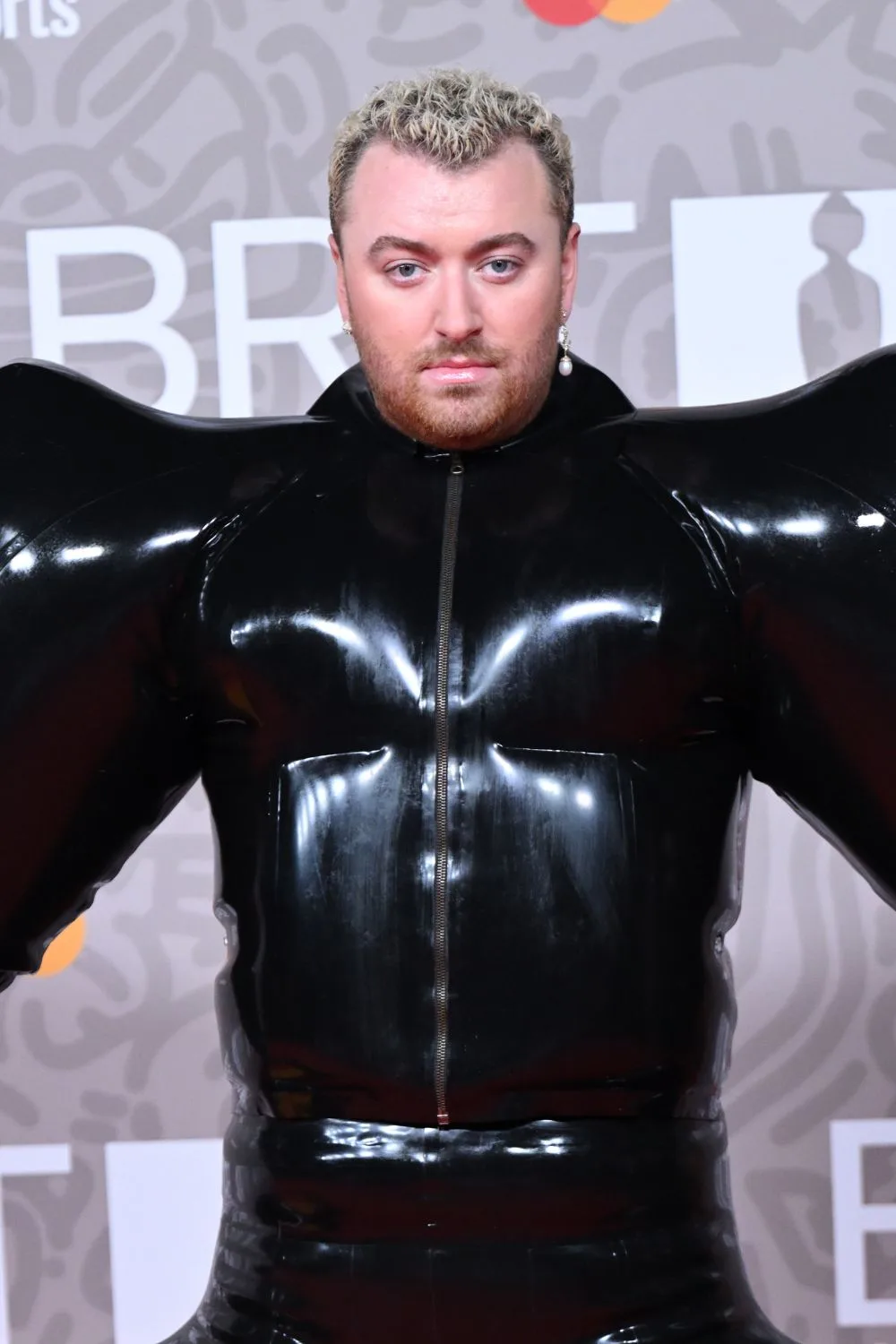 Sam Smith’s Designer Says Their BRITs Outfit Was A Clap Back To Body ...