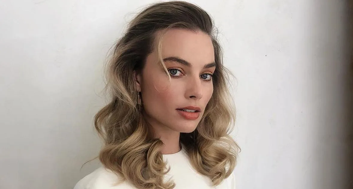 Margot Robbie Makes Big, Curly Hair & Orange Lipstick Cool
