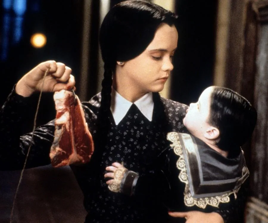 How To Achieve Wednesday Addams' Goth-Prep Style