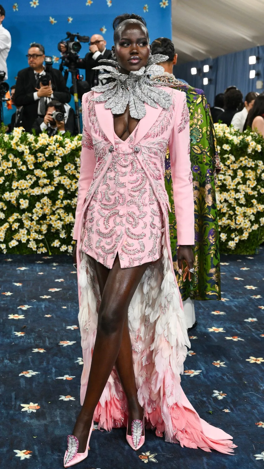 Adut Akech's Sculptural Feather Collar Sparkled At The Met Gala | ELLE