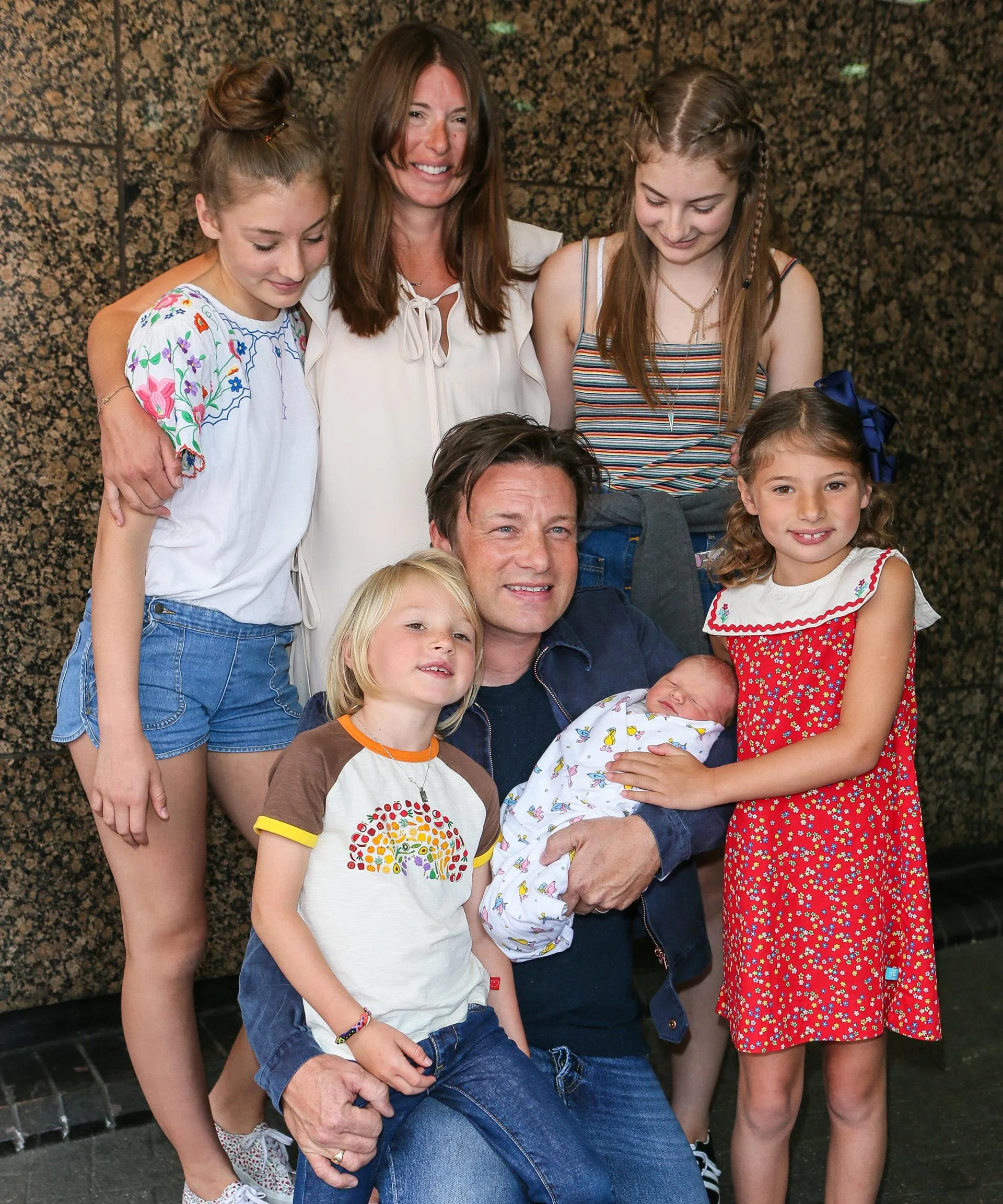 Jamie Oliver and his brood pose for first family photos