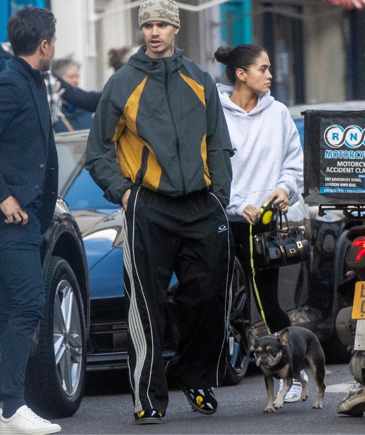 Romeo Beckham rushes to his mum's side