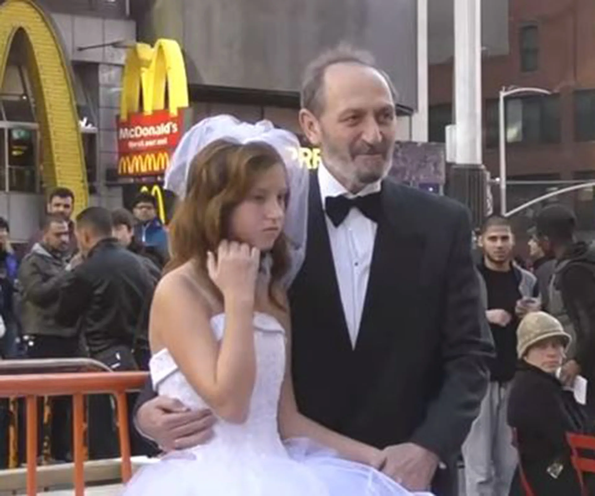 Man, 65, poses for wedding photos with 12-year-old bride in Times Square