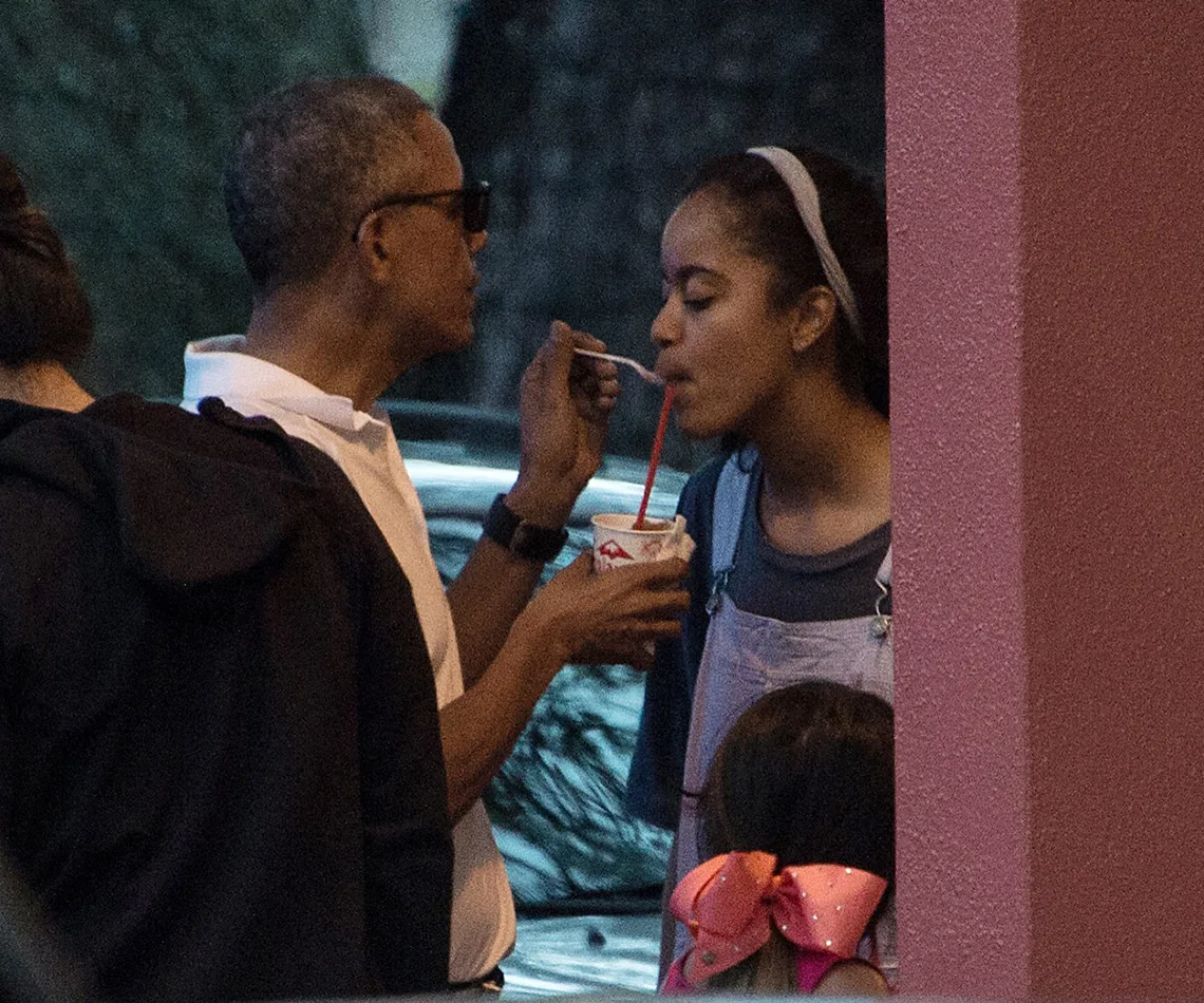 Barack and Malia Obama share an ice cream in Hawaii