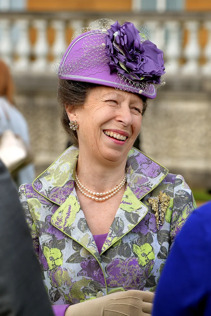 Garden party guests treated to rare Princess Anne smile