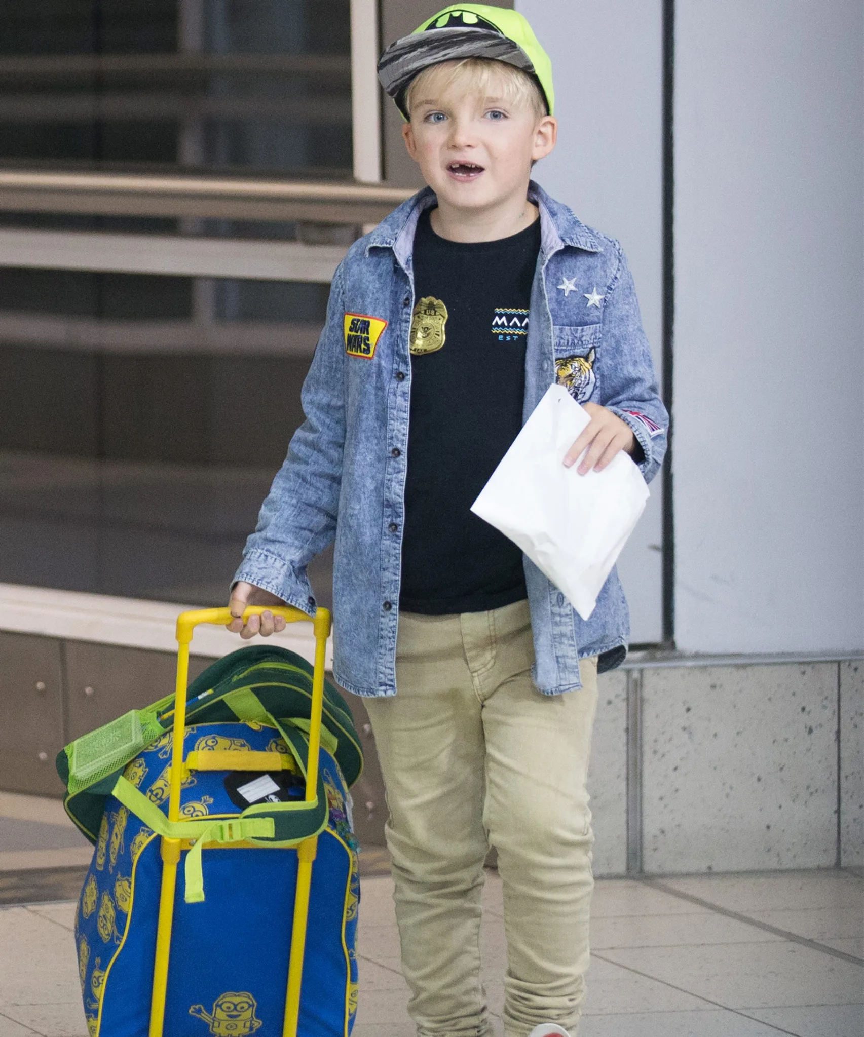 Dannii Minogue and son Ethan at the airport