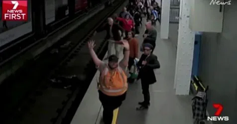 Terrifying footage of man lurching in front of train