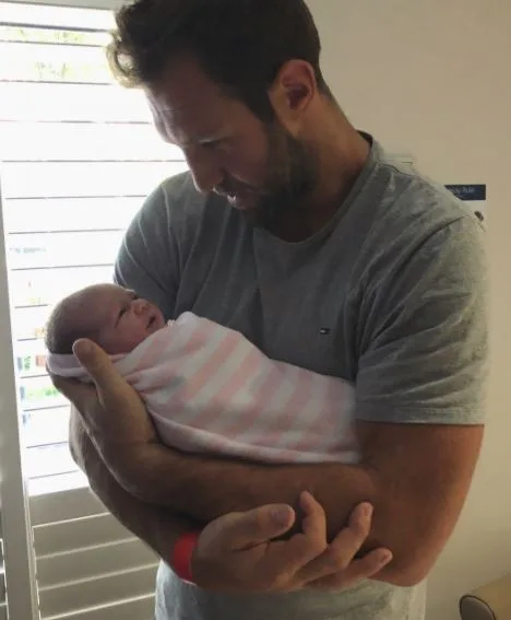 AFL star Travis Cloke debuts first pic of his baby girl