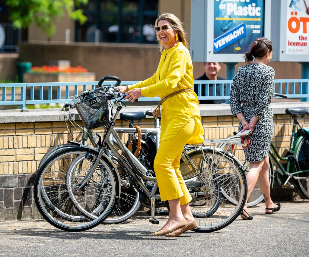 Queen Máxima of the Netherlands bike rides to official royal event