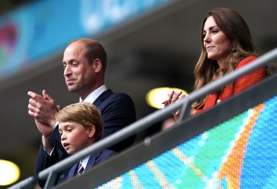 Prince George, 7, wears a matching suit to his dad at the soccer