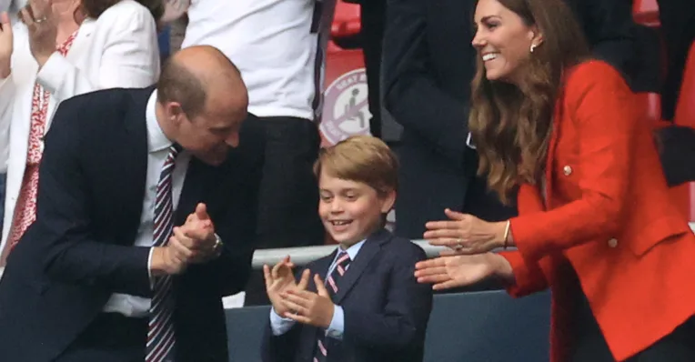 Prince George, 7, wears a matching suit to his dad at the soccer