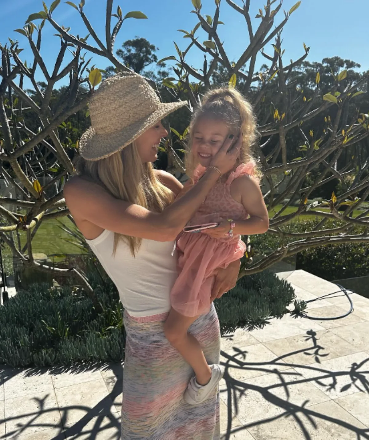 Jennifer Hawkins and Jake Wall's family in photos