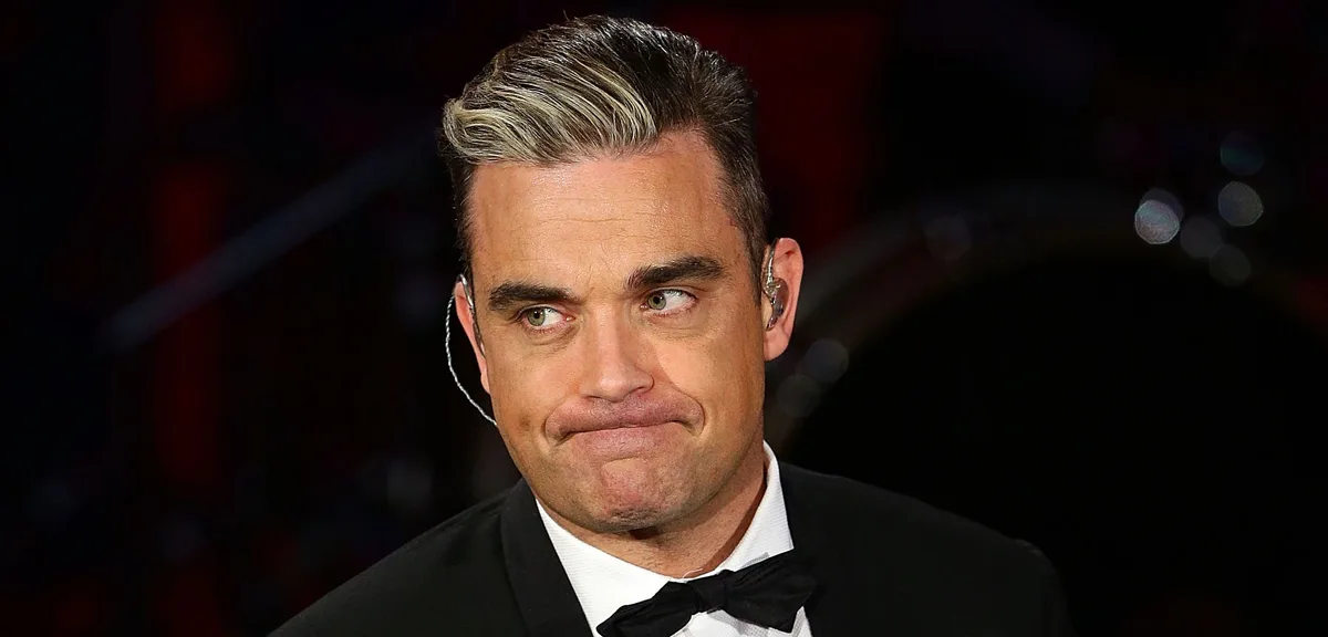 Robbie Williams admits to hair transplant | Now to Love - New Zealand