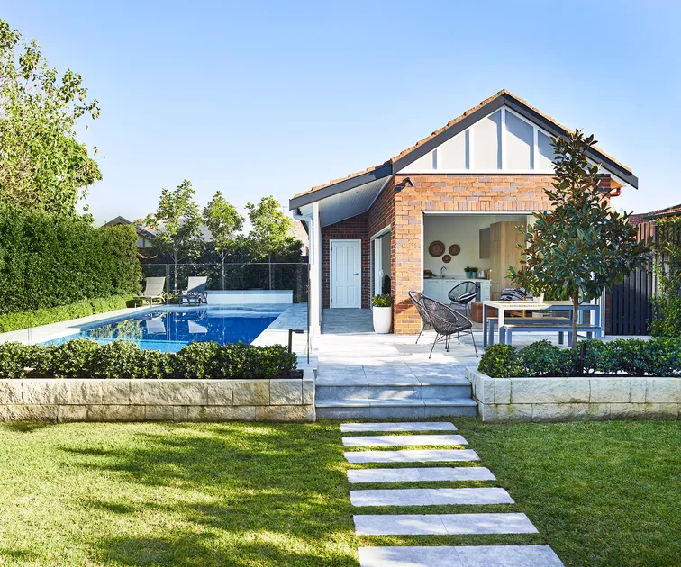 An Old Garage Transformed Into Party-Ready Pool House