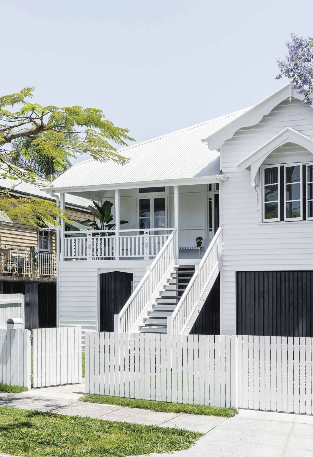 A classic, all-white timber Queenslander in Brisbane