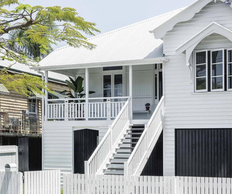 A classic, all-white timber Queenslander in Brisbane