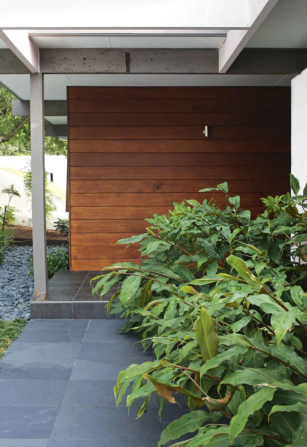 A Japanese-style garden with a mid-century modern touch