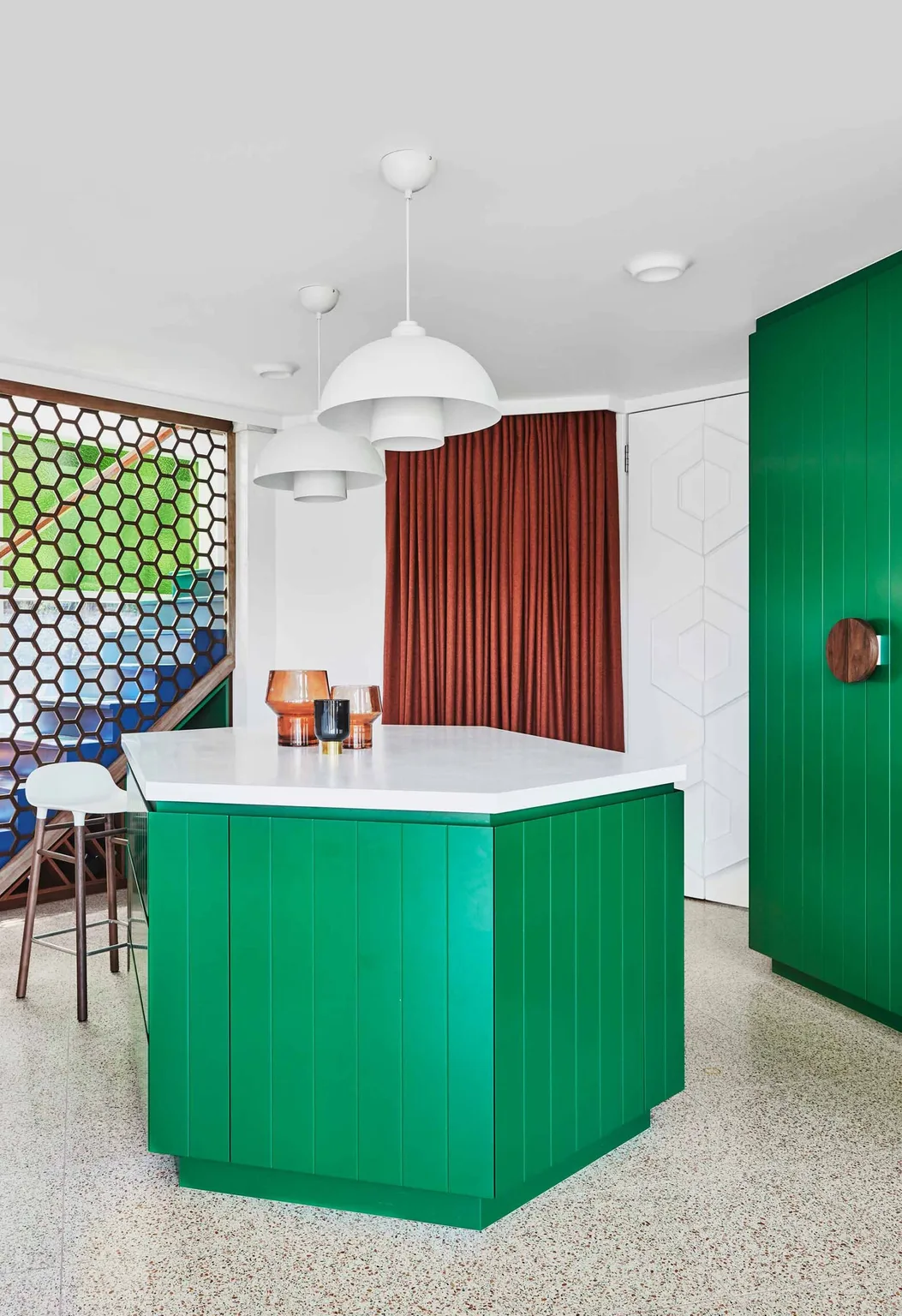 A hexagonal house with mid-century modern style