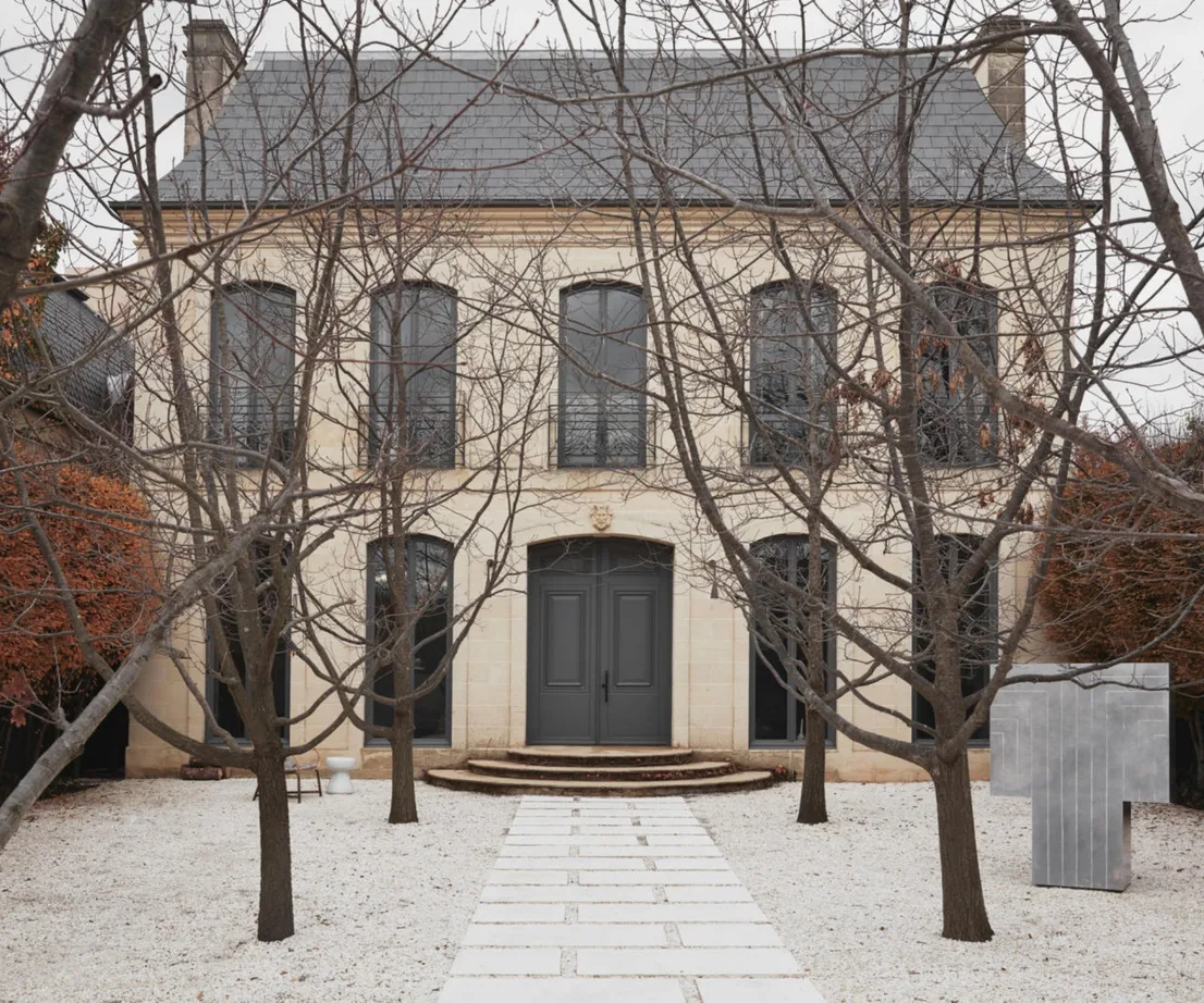 A chateau-style home with a minimalist interior