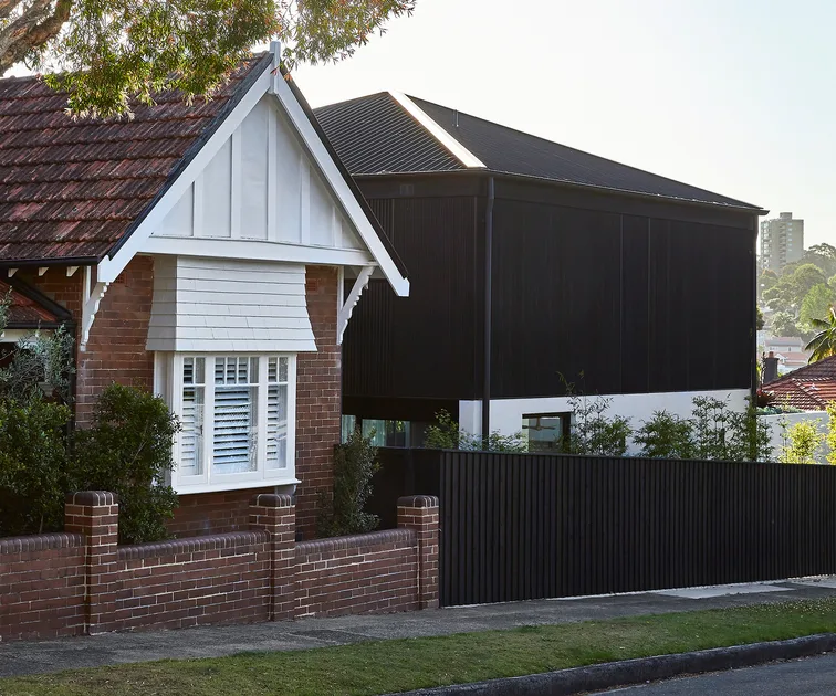 A Federation-style home with a tropical modernist extension