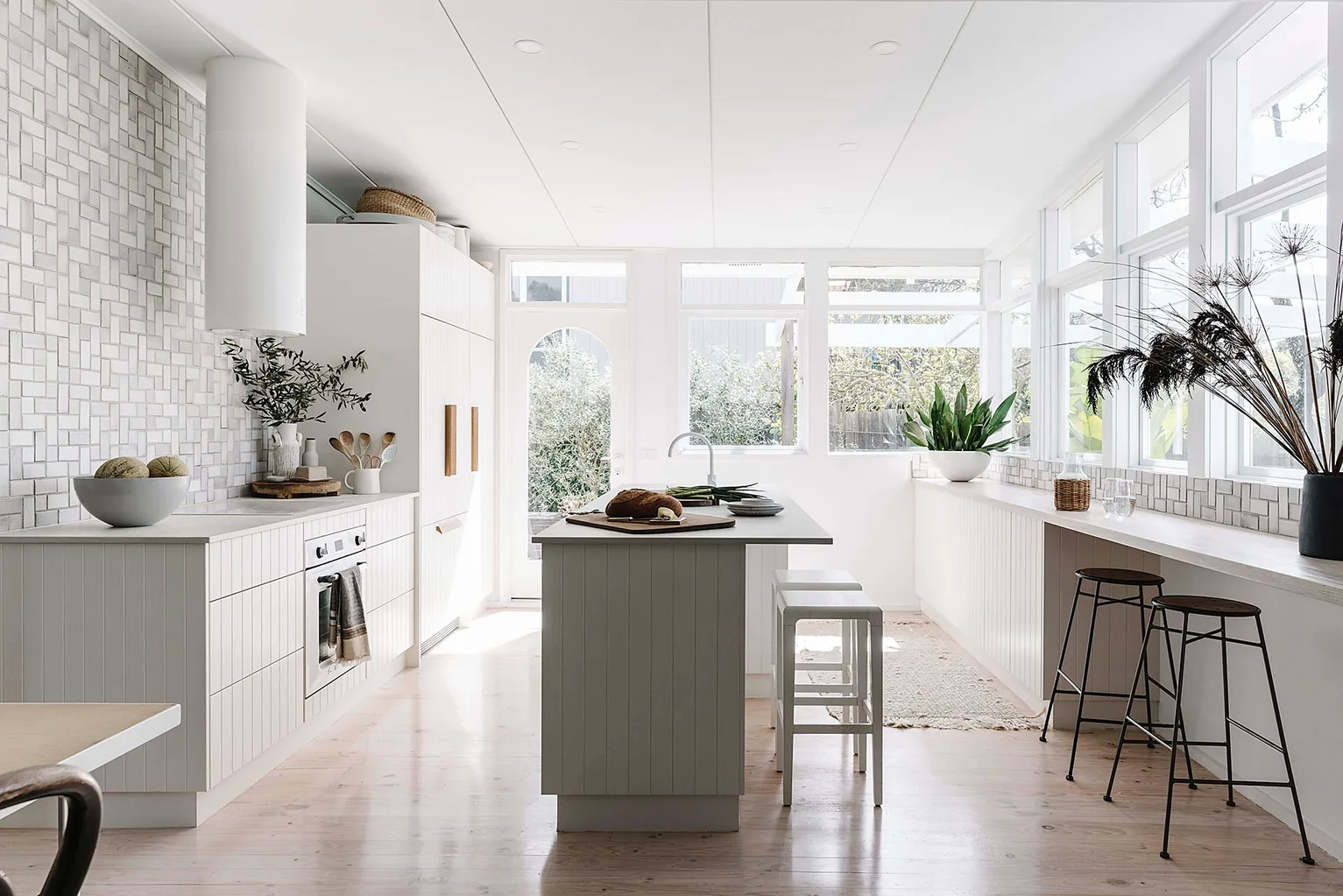 A tired mid-century home turned airy beach shack