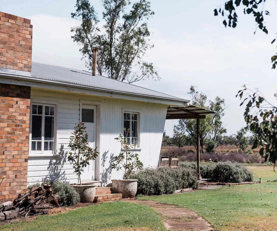 A simply styled, rustic farmhouse on a merino sheep farm