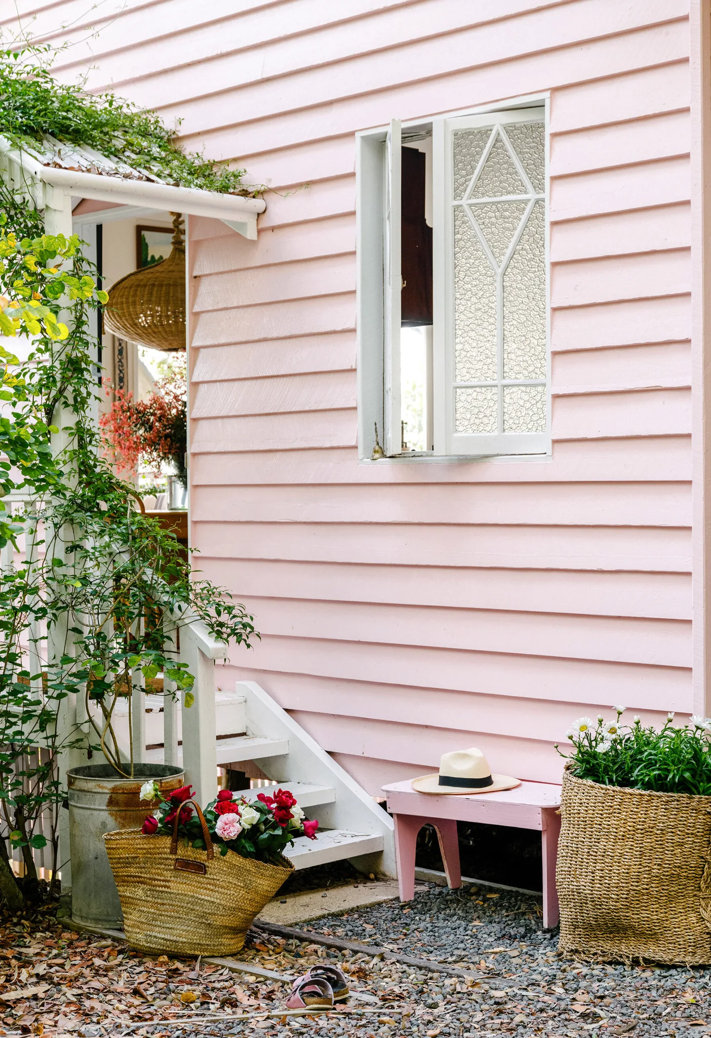 A pink lakeside cottage on the Sunshine Coast