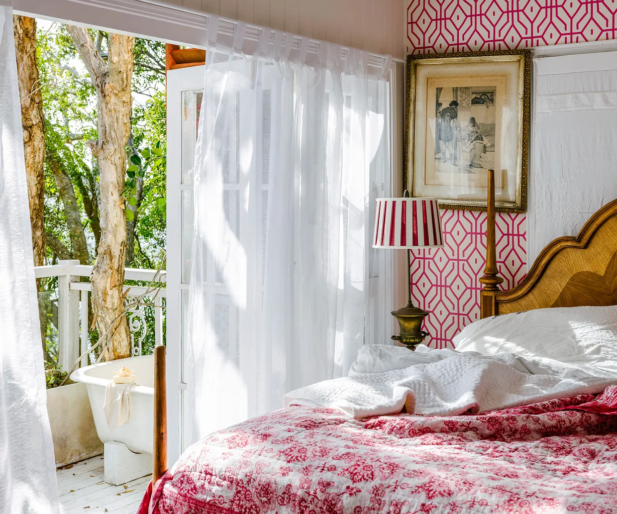 A pink lakeside cottage on the Sunshine Coast