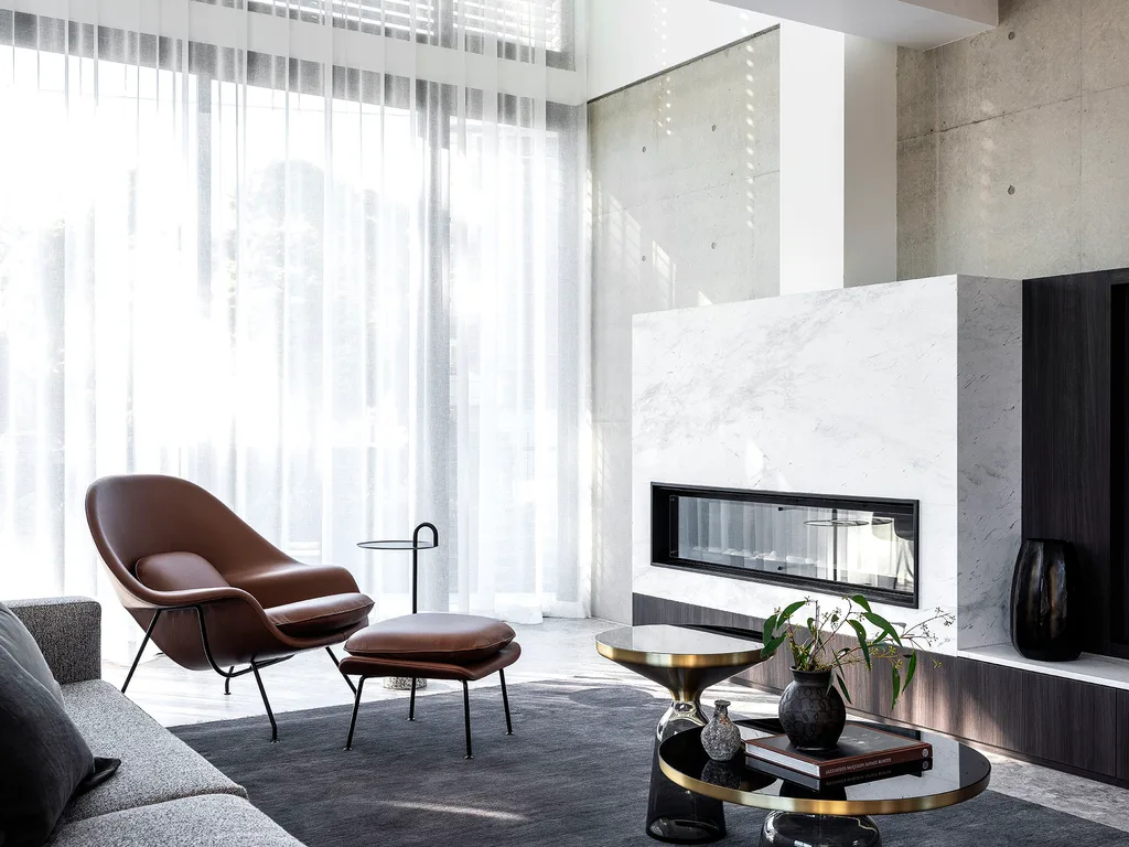 Tour a striking X-shaped home that functions around family