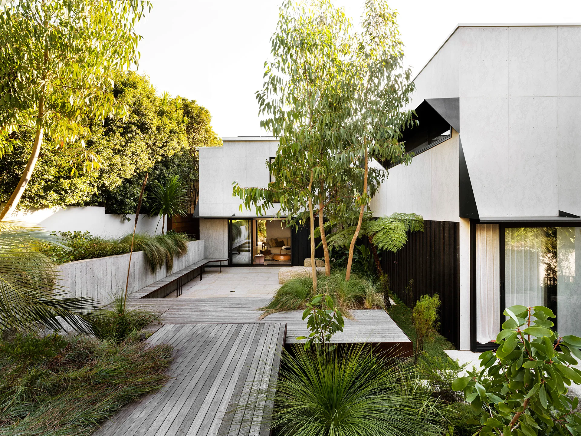 A Native Garden Filled With Floating Stepped Platforms