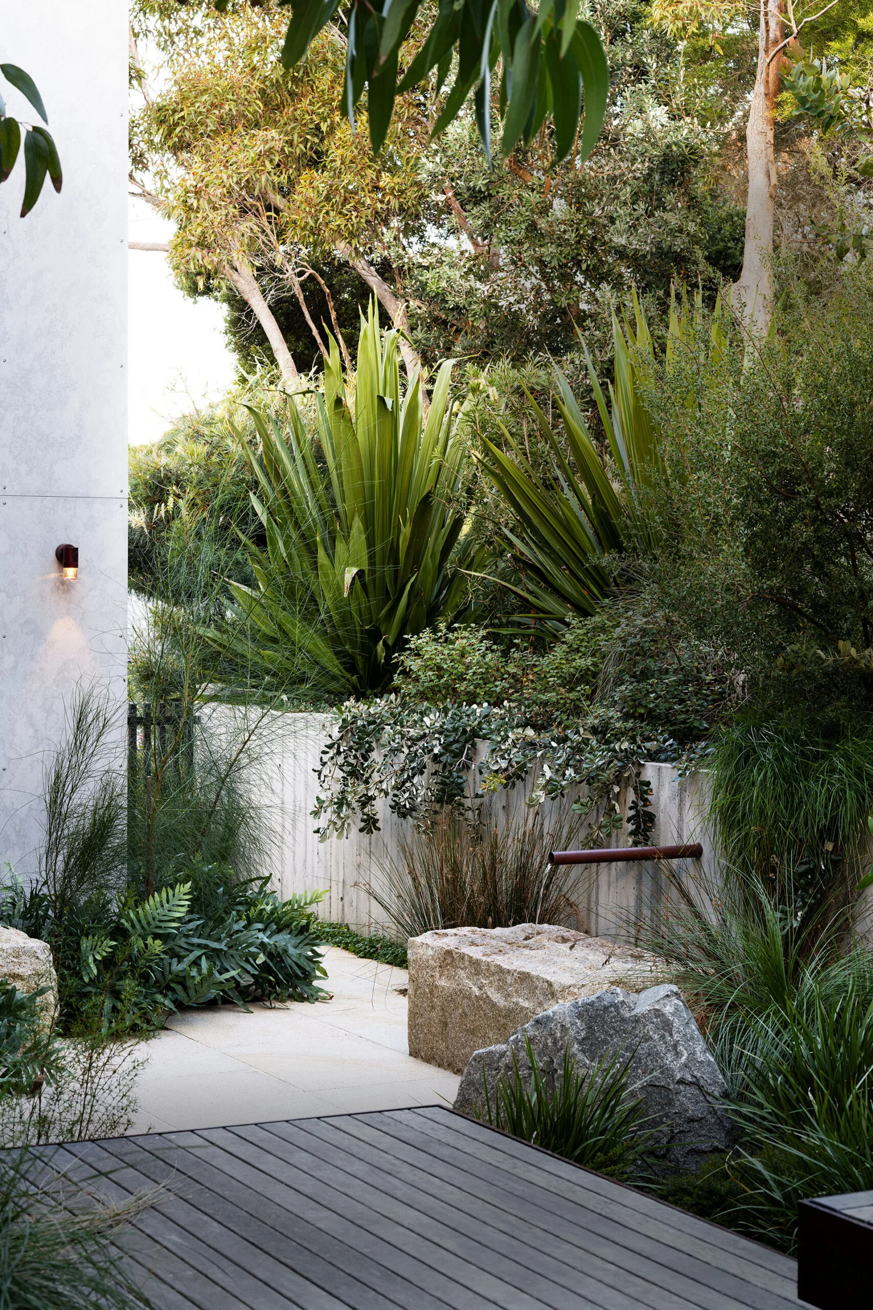 A Native Garden Filled With Floating Stepped Platforms