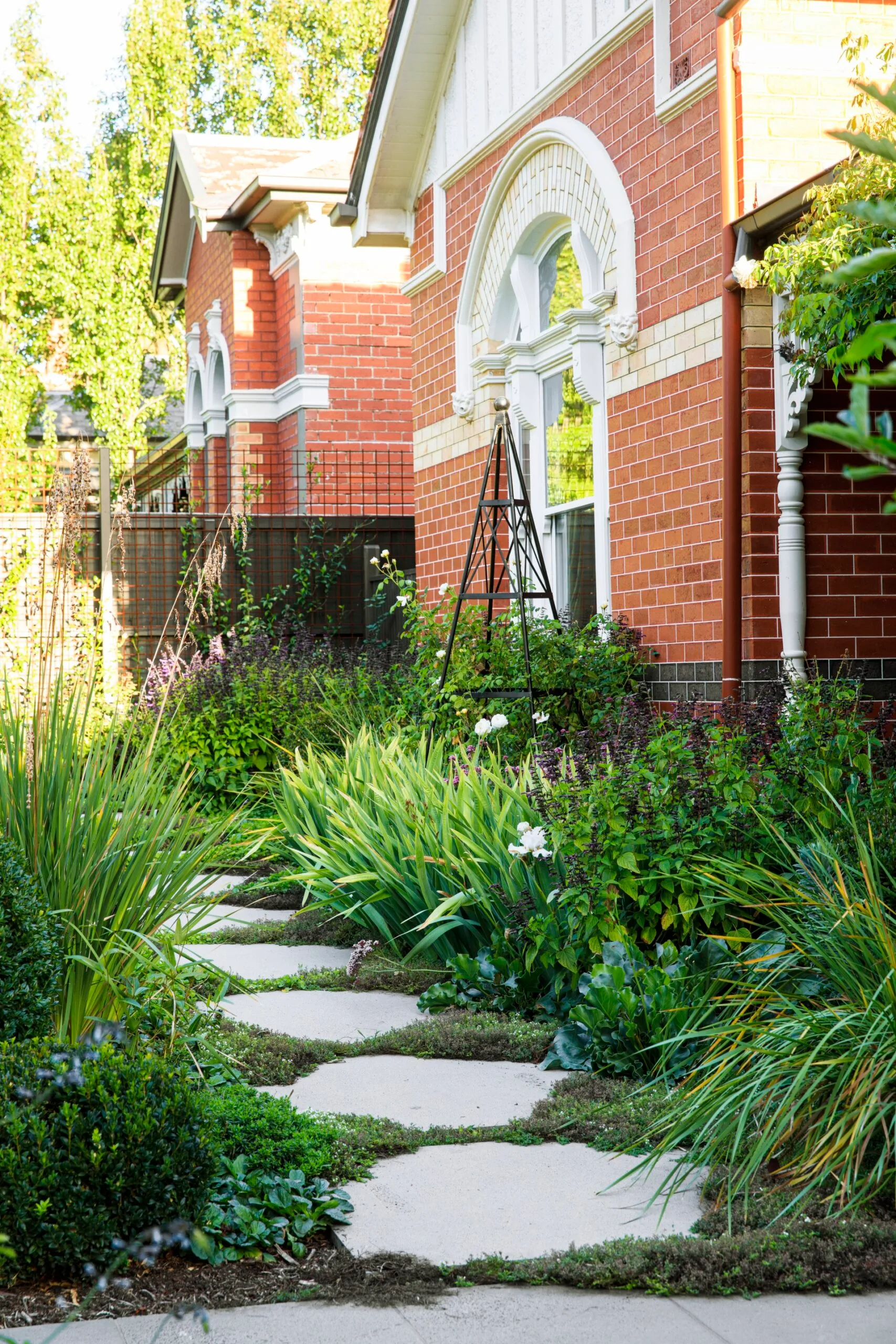 A Formal Garden Designed To Fit In With Family Life