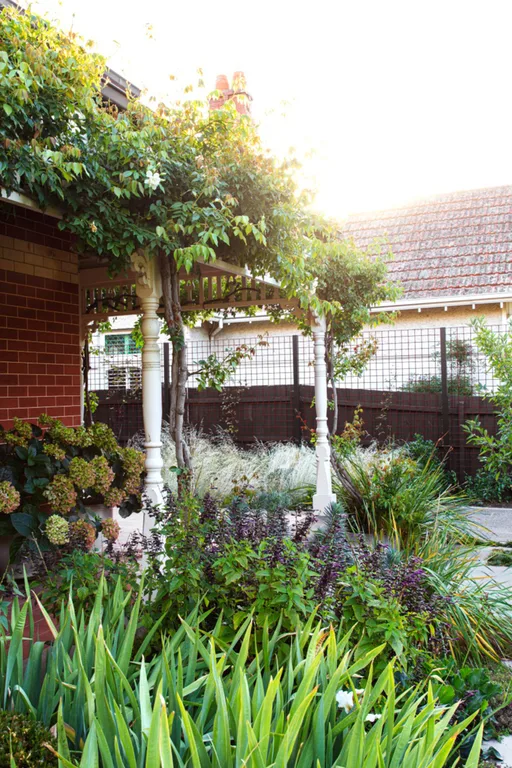 A Formal Garden Designed To Fit In With Family Life