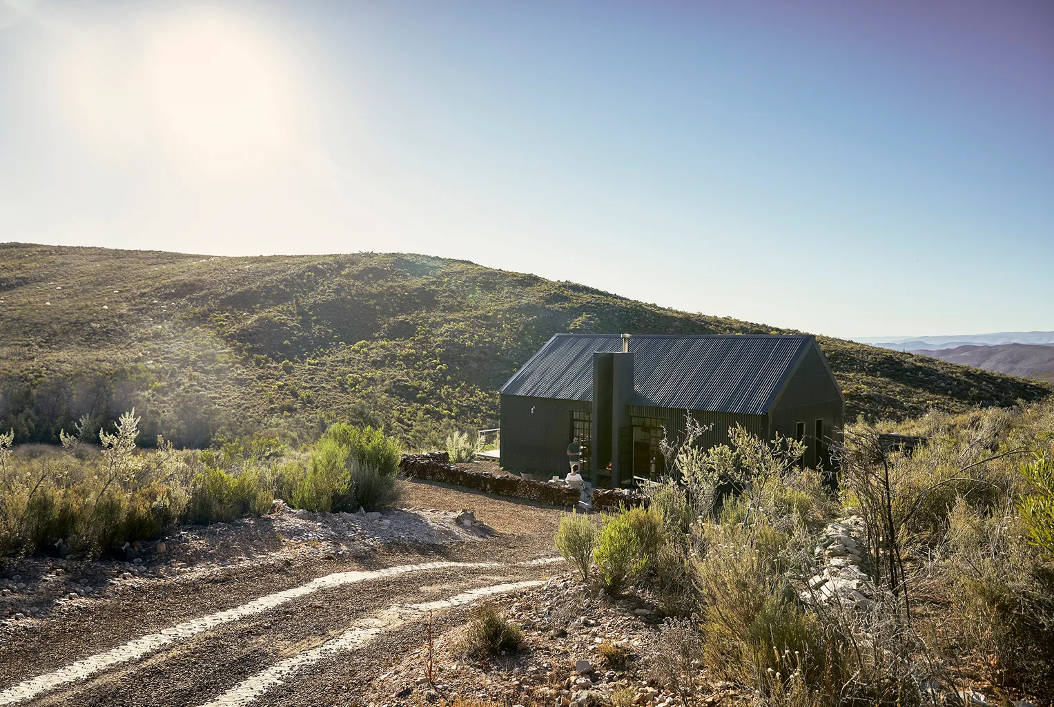 A Modern Black Cabin In South Africa
